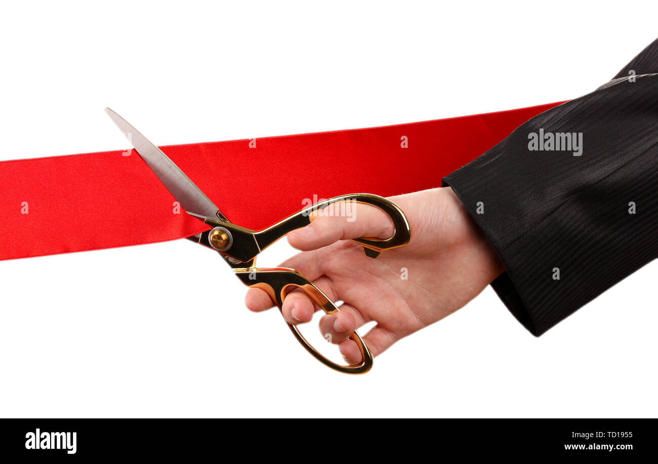 Cutting red ribbon, isolated on white Stock Photo - Alamy
