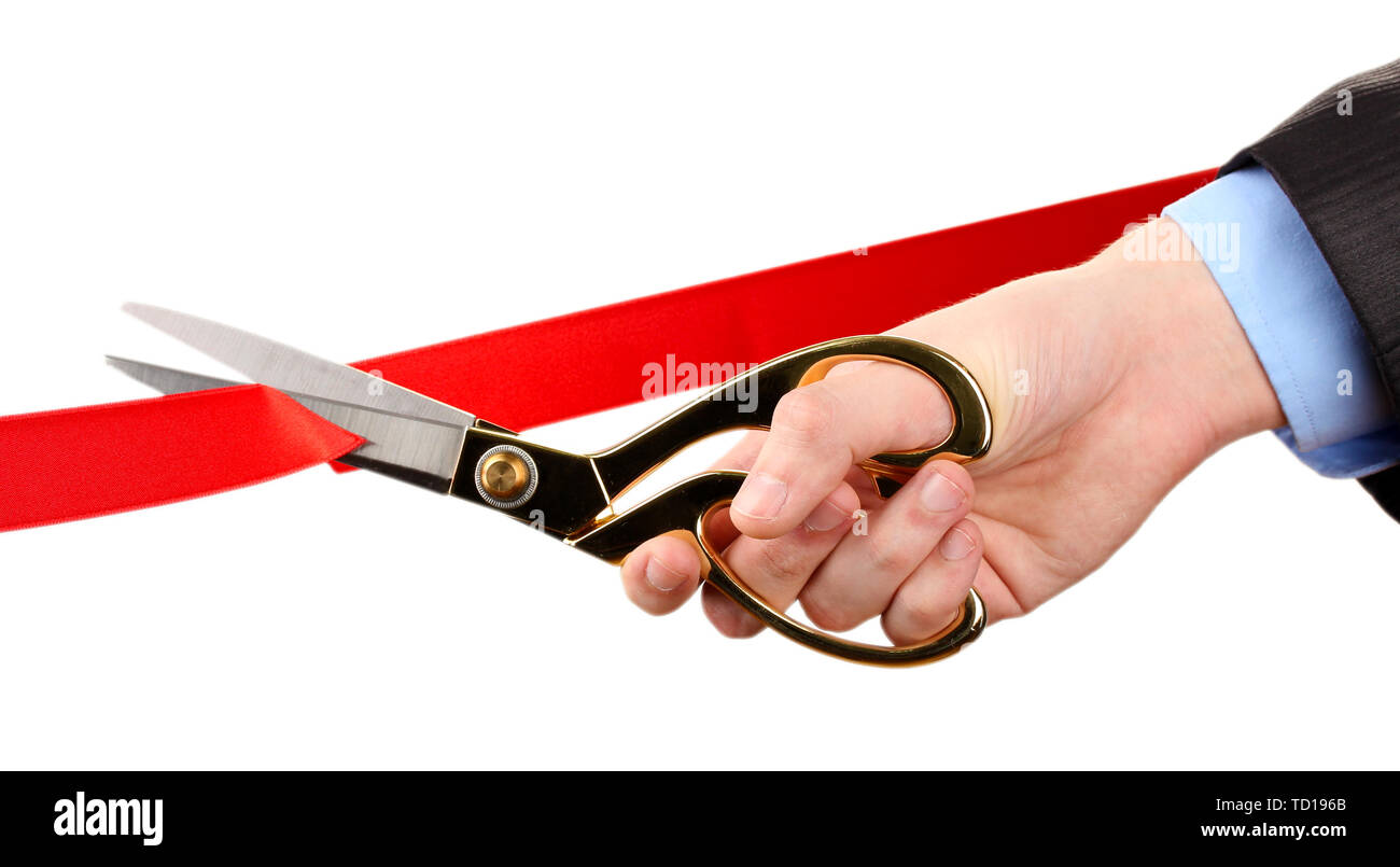 Cutting red ribbon, isolated on white Stock Photo - Alamy