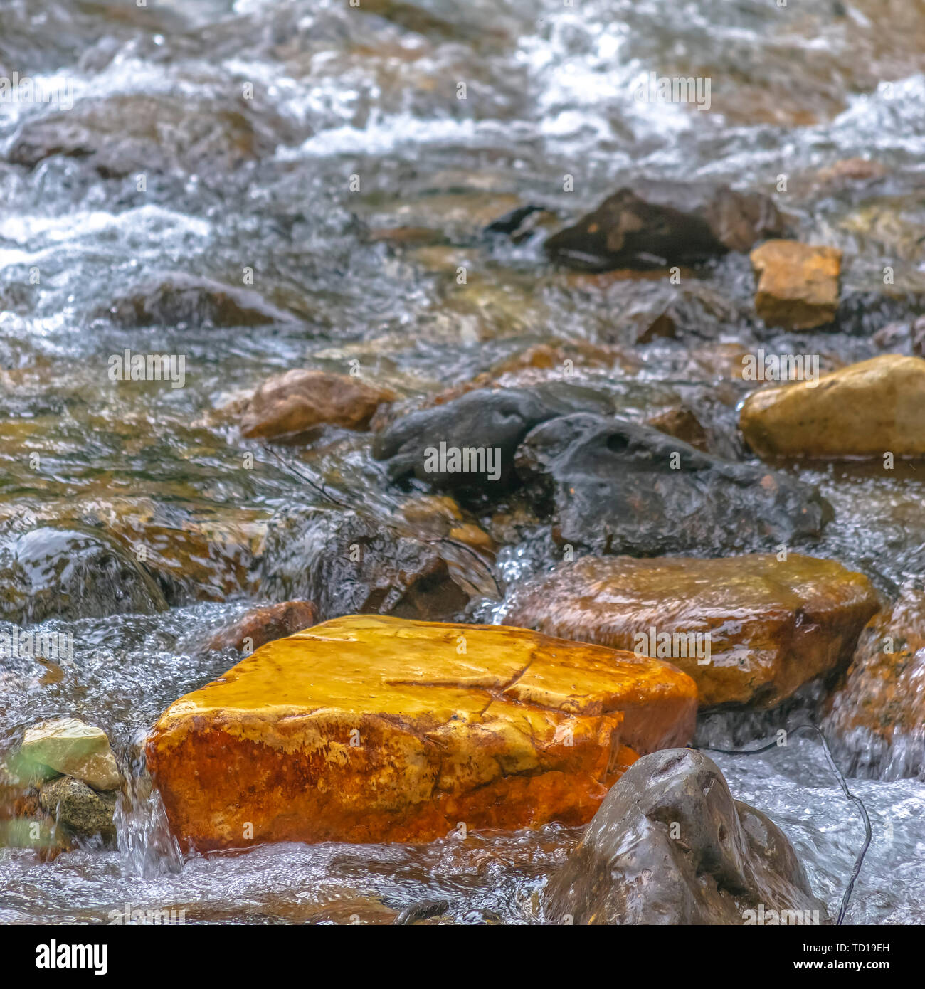 Sparkling clear water flowing on a rocky stream Stock Photo - Alamy