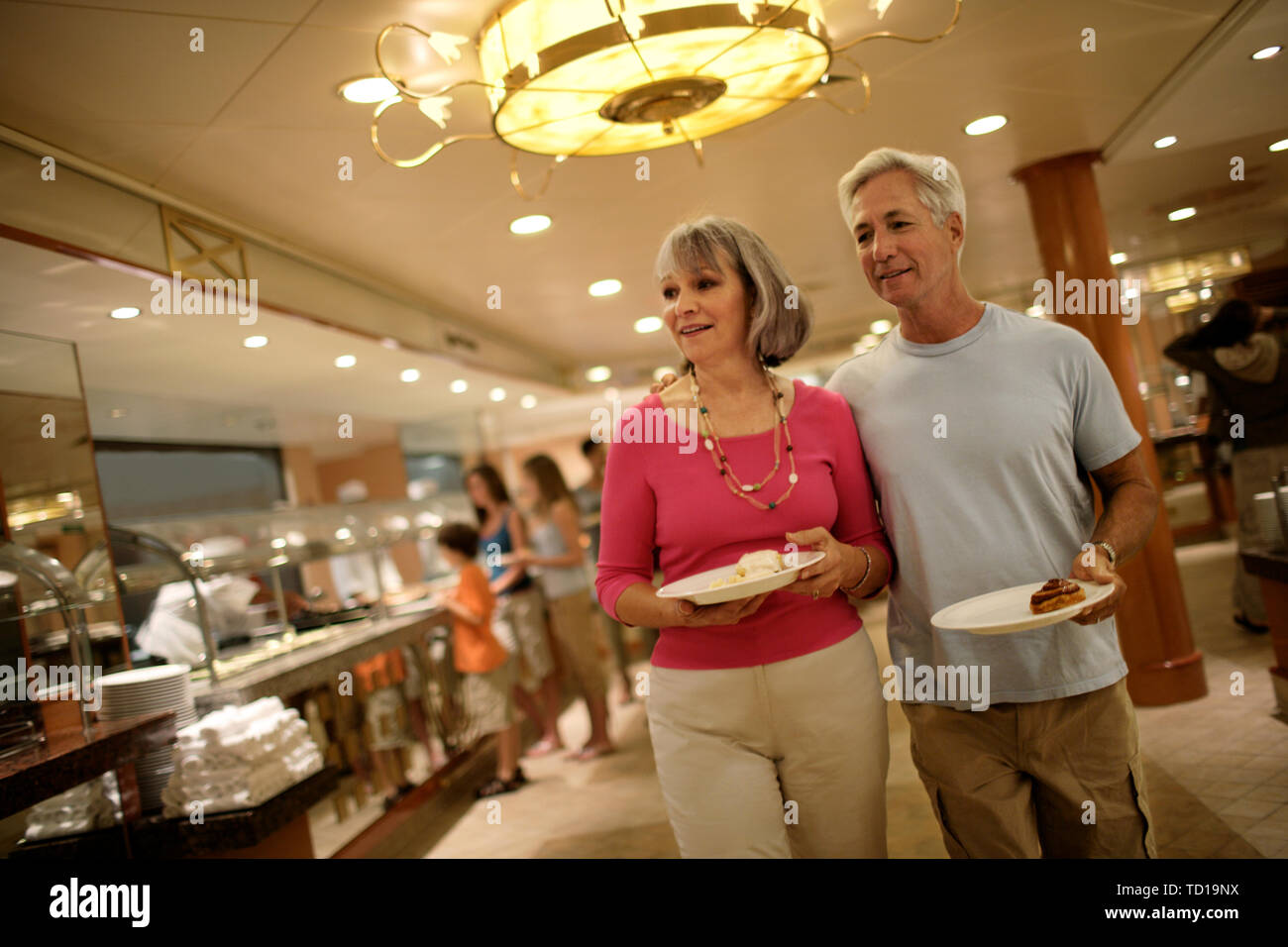 Carrying plates hi-res stock photography and images - Alamy