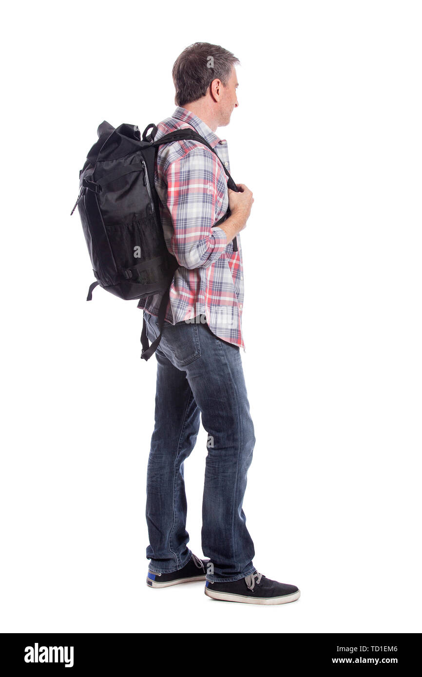 Middle-aged man hiking and carrying a backpack on a white background ...