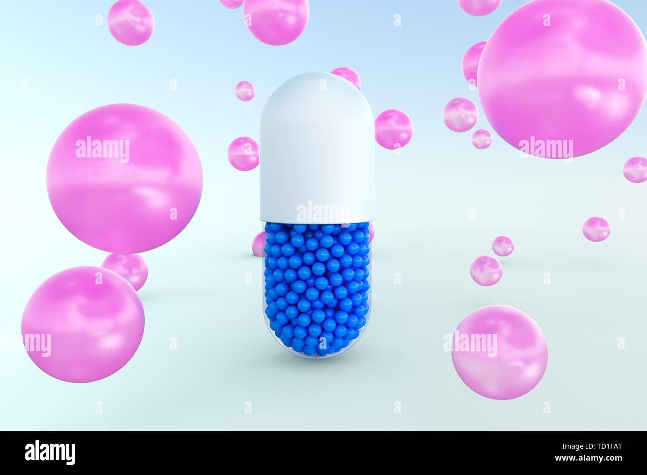 Blue granular capsule, 3-D rendering Stock Photo - Alamy