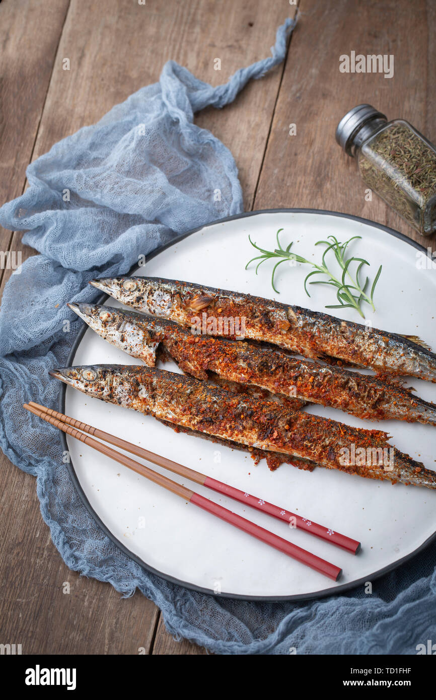 Fried autumn knife fish Stock Photo - Alamy