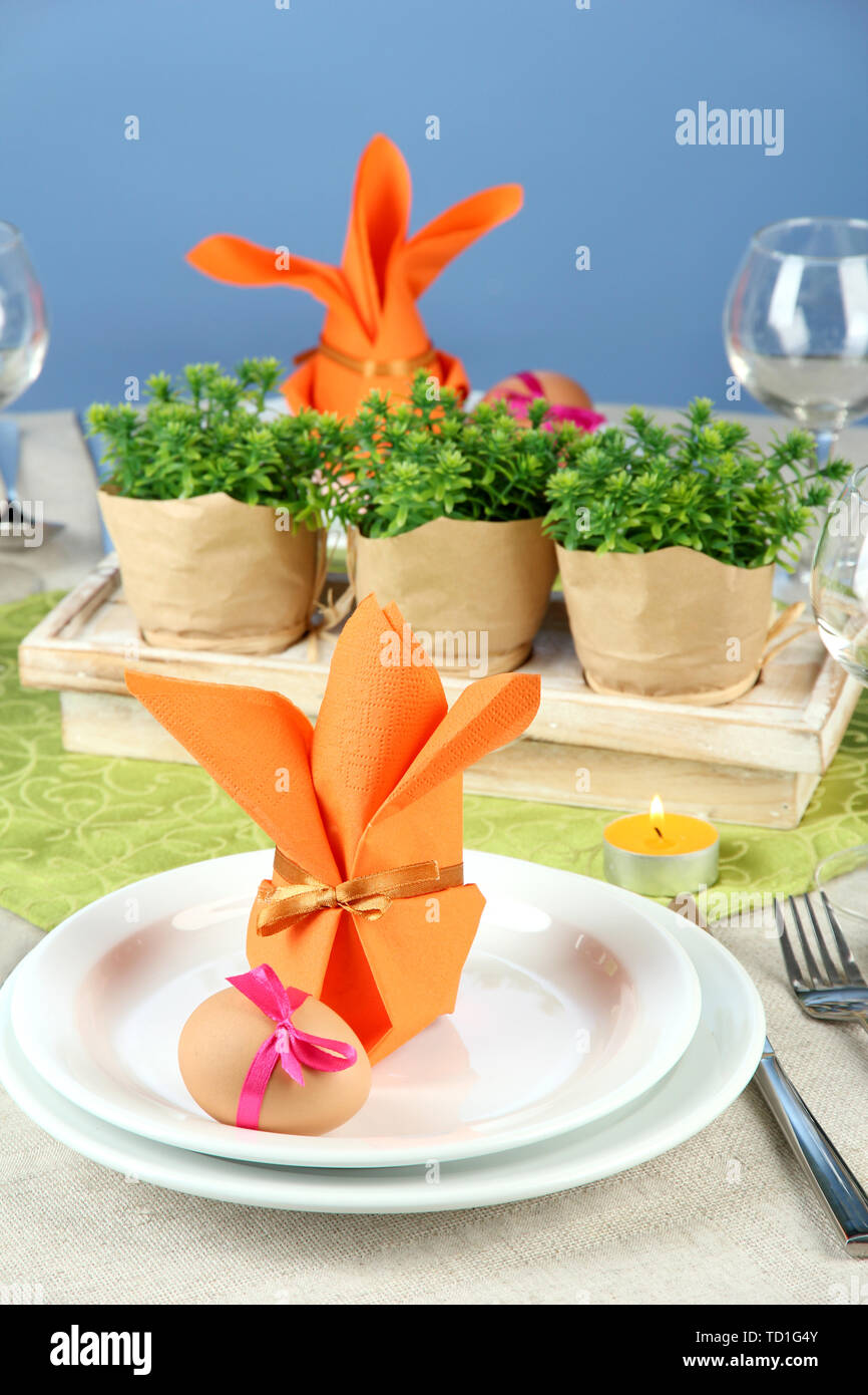 Easter table setting on color background Stock Photo - Alamy