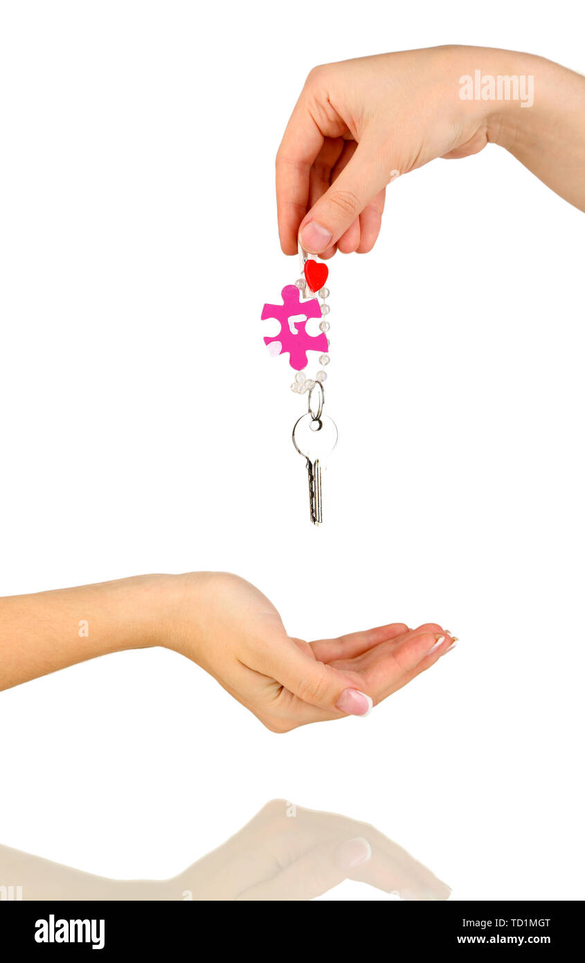 Transfer of house keys isolated on white Stock Photo - Alamy