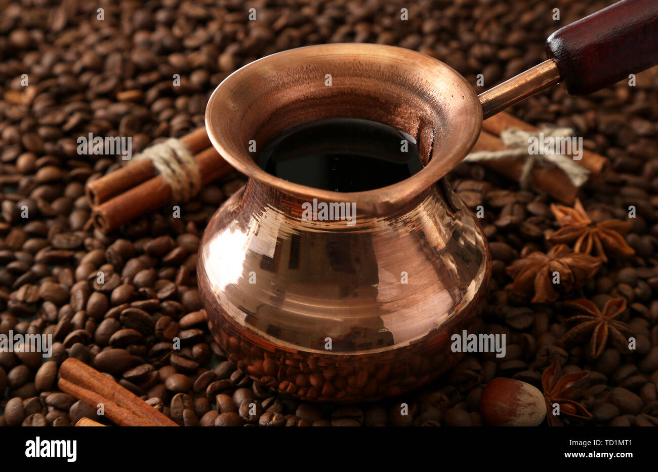 Pot of coffee on coffee beans background Stock Photo - Alamy