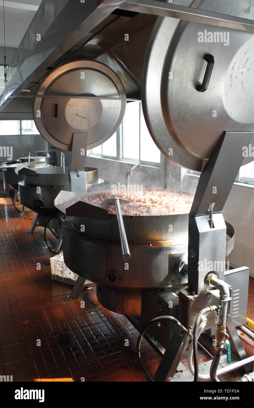 Food stir-frying processing Stock Photo - Alamy