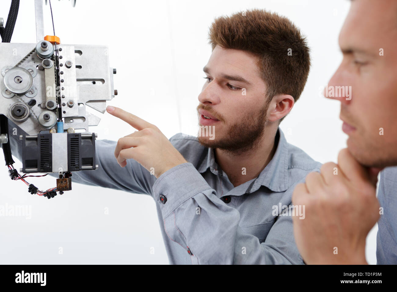 student with automated robotic arm Stock Photo - Alamy