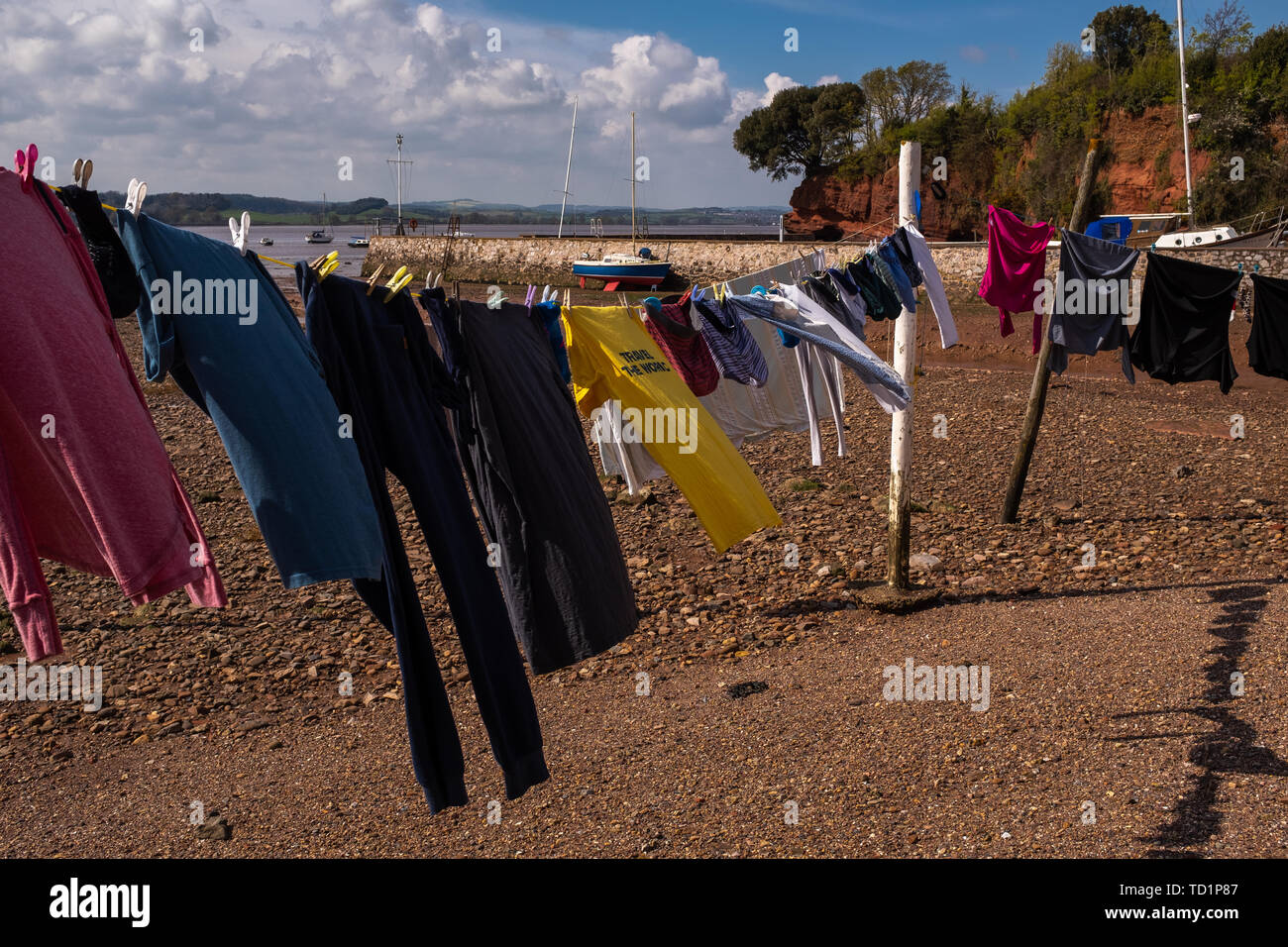 Clothes drying in the wind on a clothes line hi-res stock photography ...