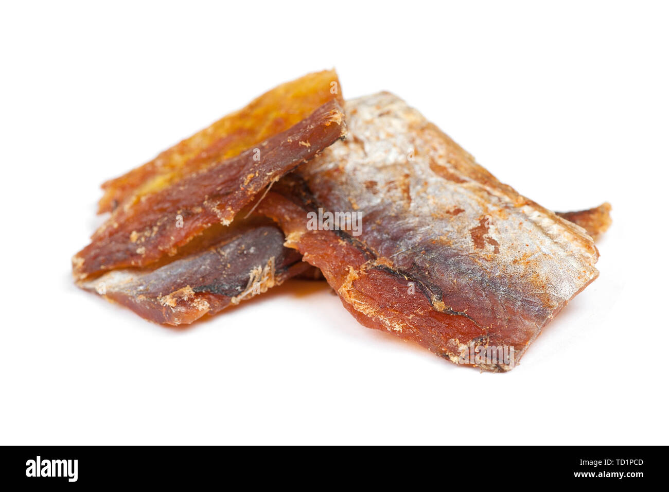 Pieces of cleaned dried fish isolated on white (Dry Peppered Pollack ...