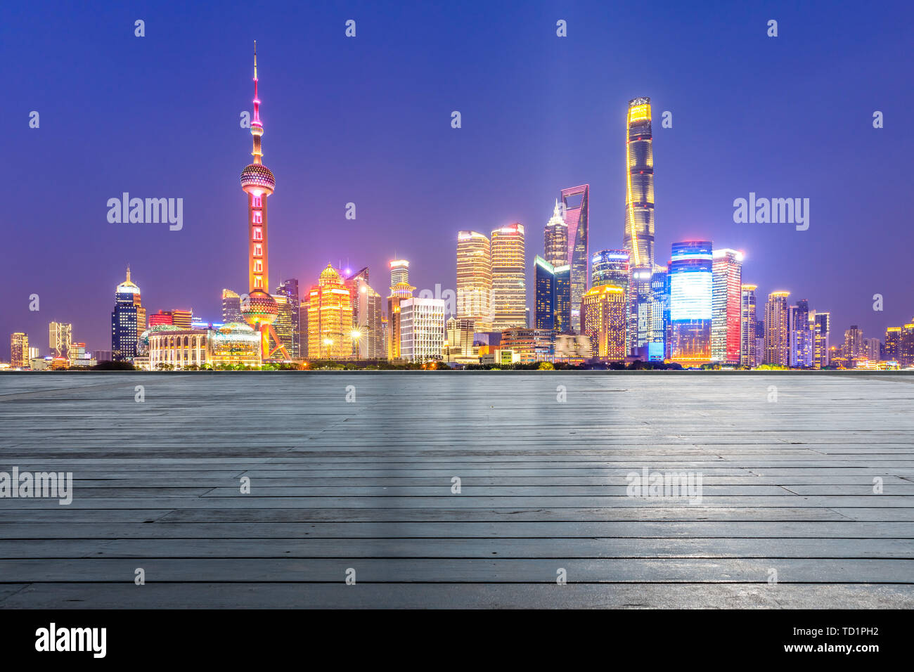 Shanghai skyline and modern city skyscrapers with wooden board square ...