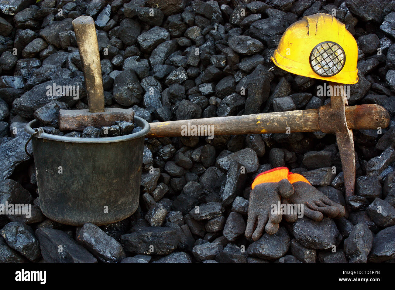 Mining tools on a background of coal Stock Photo - Alamy