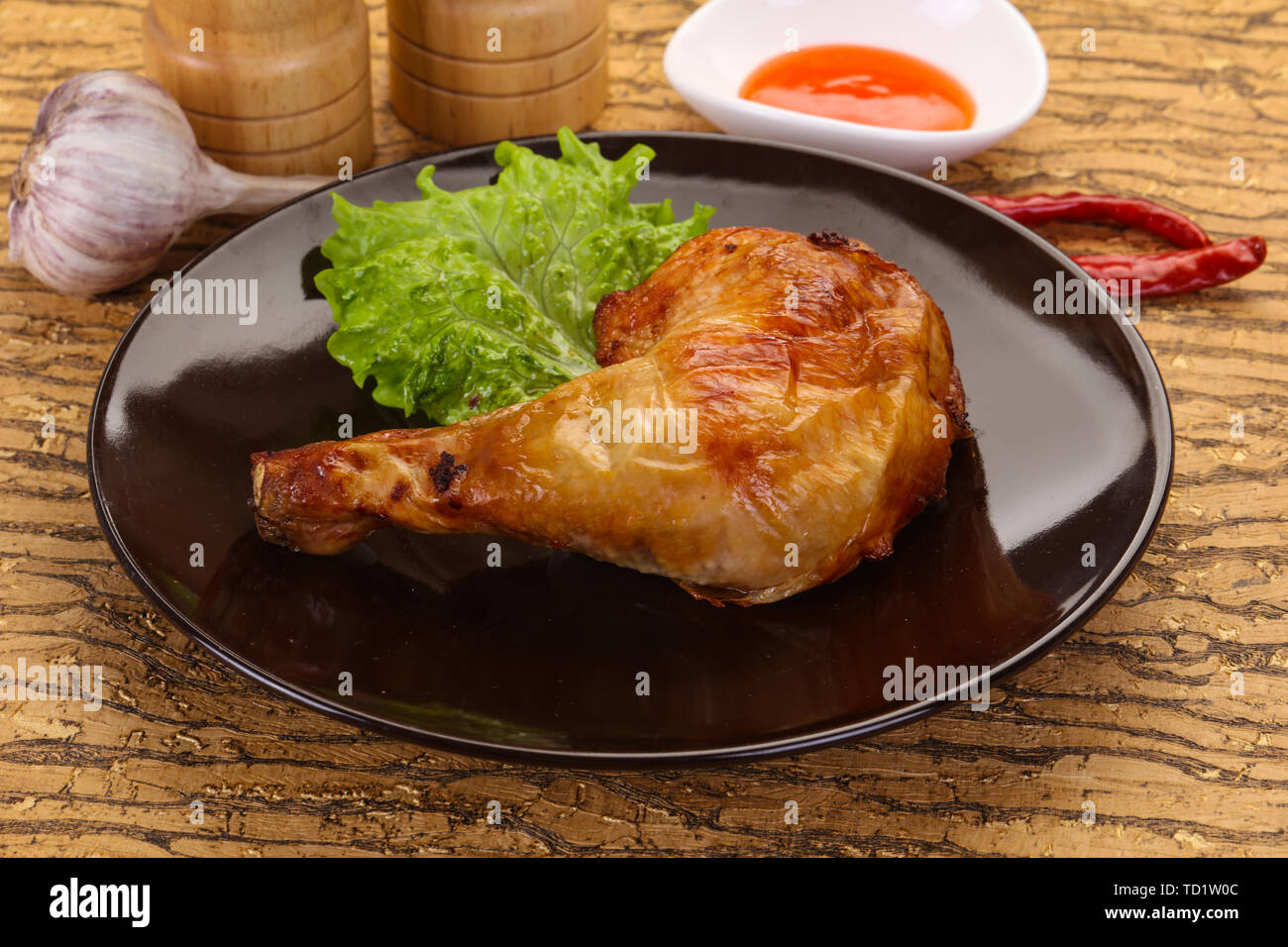 Crispy tasty Roasted chicken leg Stock Photo - Alamy