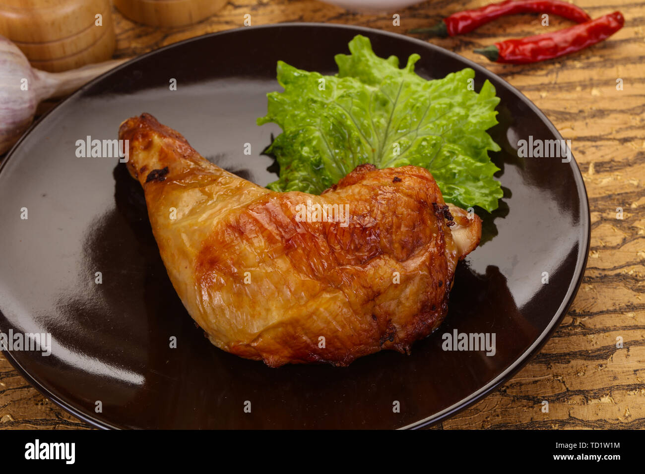 Crispy tasty Roasted chicken leg Stock Photo - Alamy