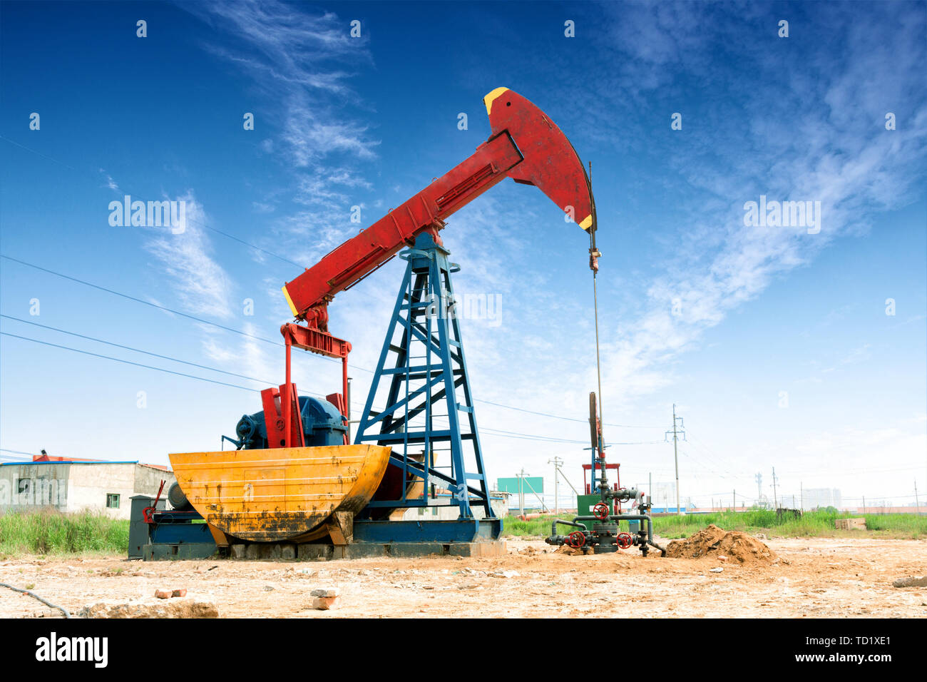 Oil well and bluesky Stock Photo - Alamy