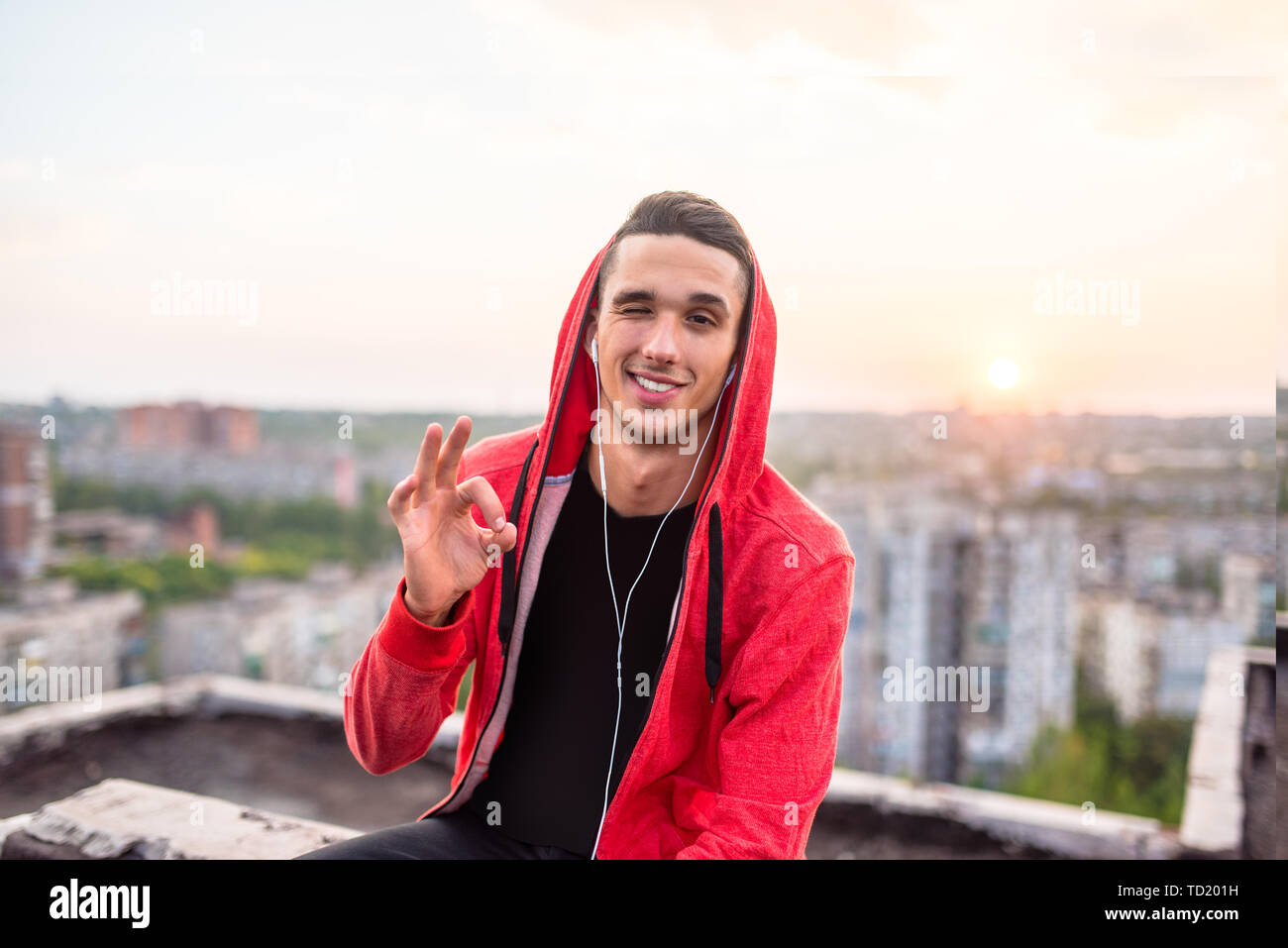 Manly but romantic sport man taking a smartphone or mobile phone photo ...