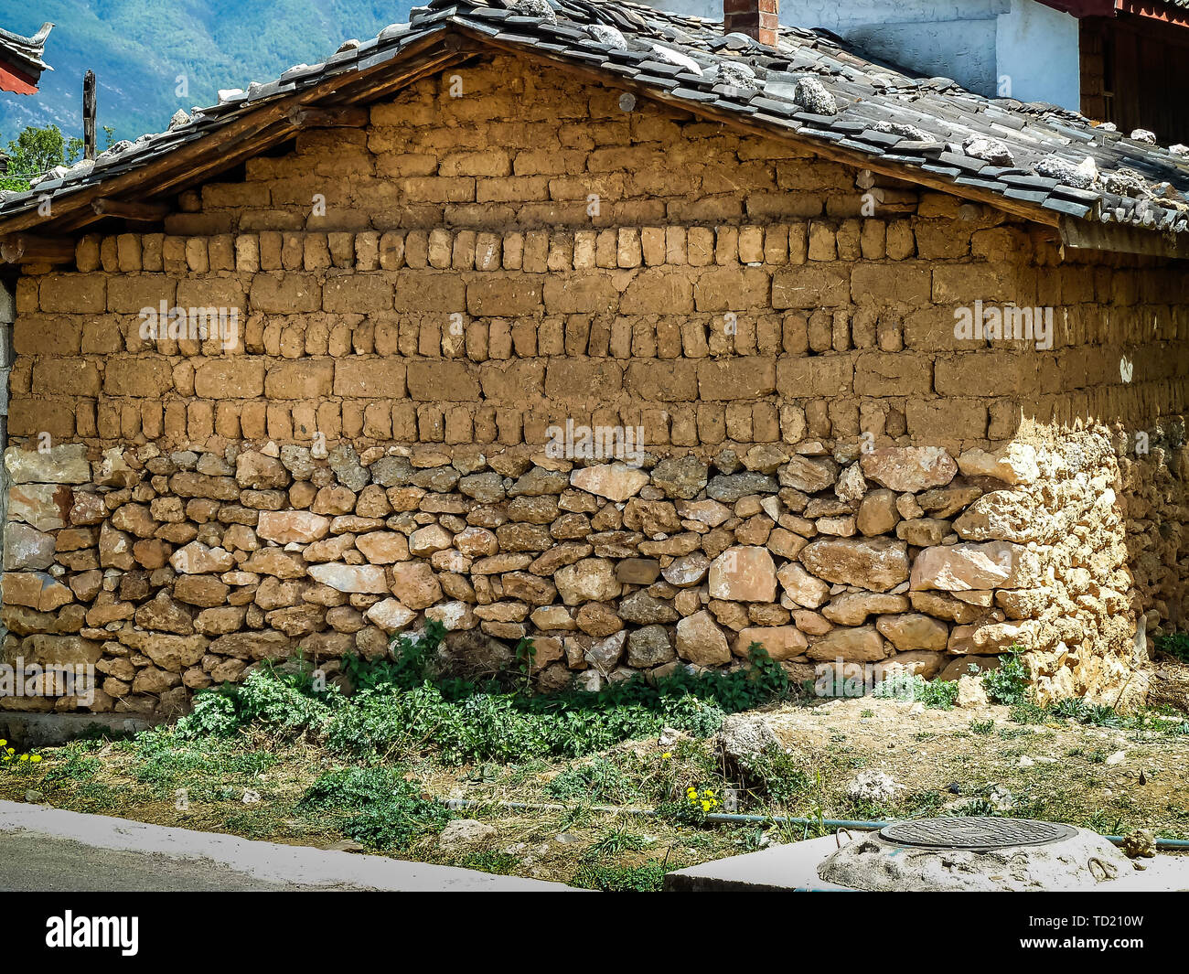 Stone and mud brick built barn in rural Chinese village Stock Photo - Alamy