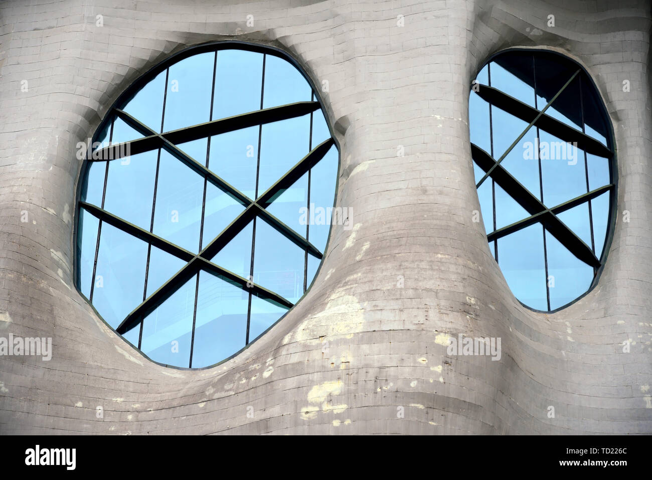 Modern architecture, creative glass windows Stock Photo - Alamy