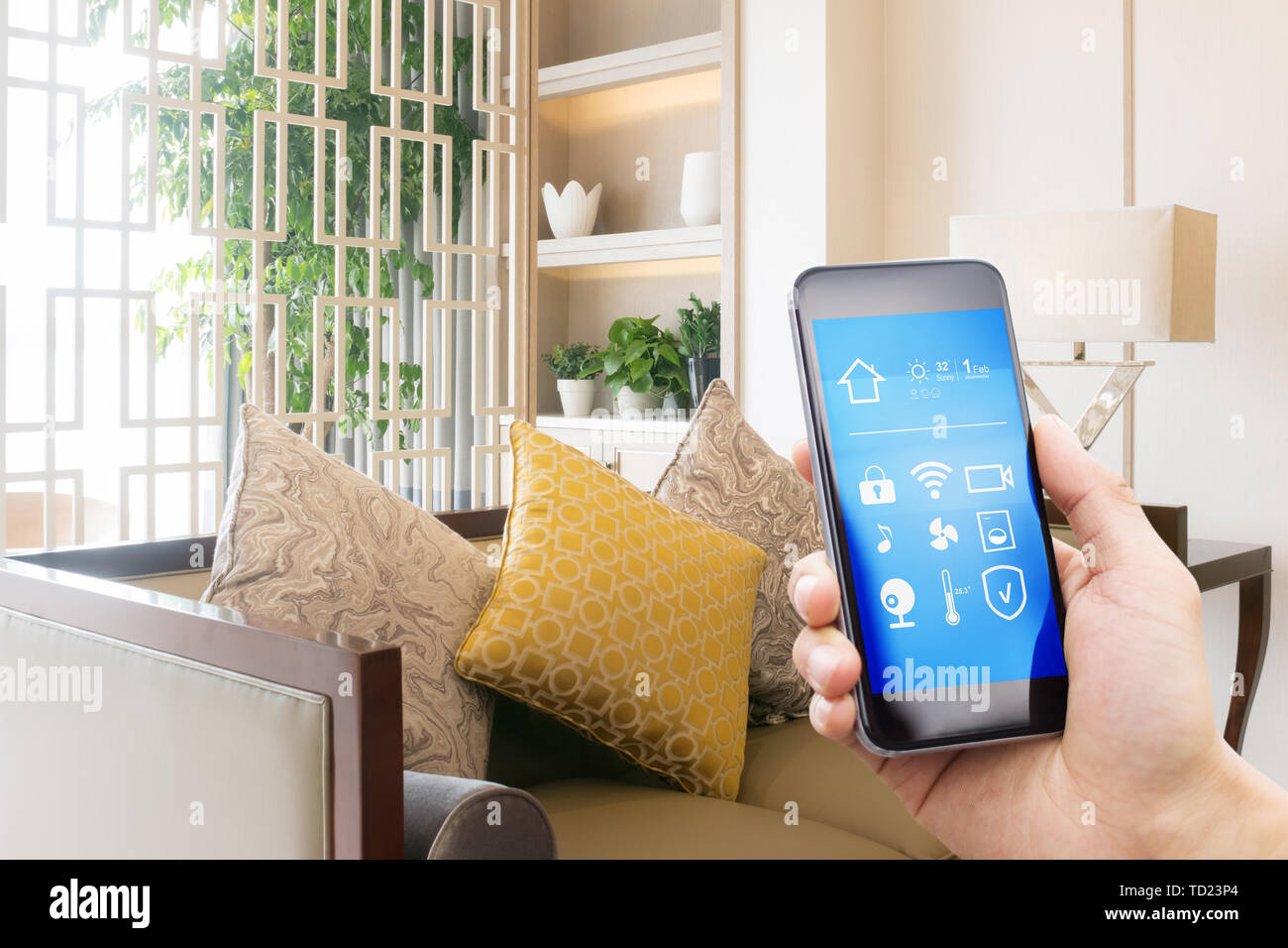 smart phone with smart home with modern living room Stock Photo - Alamy