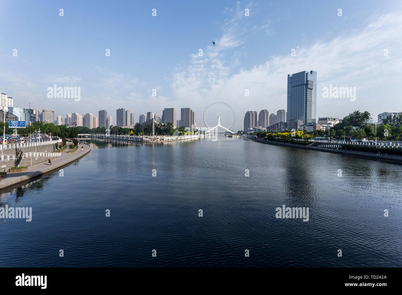 modern buildings in urban city at riverbank Stock Photo - Alamy