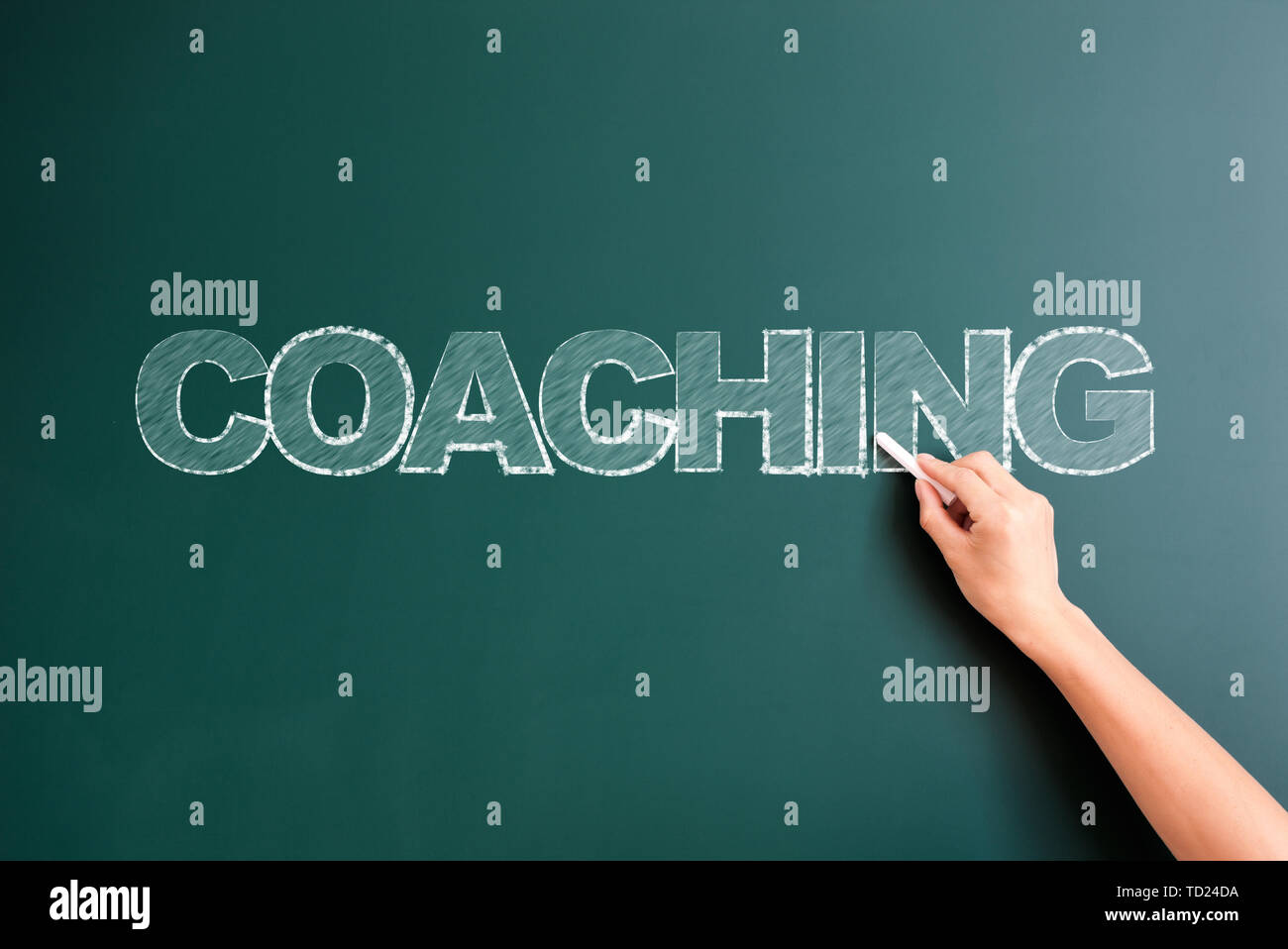 writing coaching on blackboard Stock Photo - Alamy