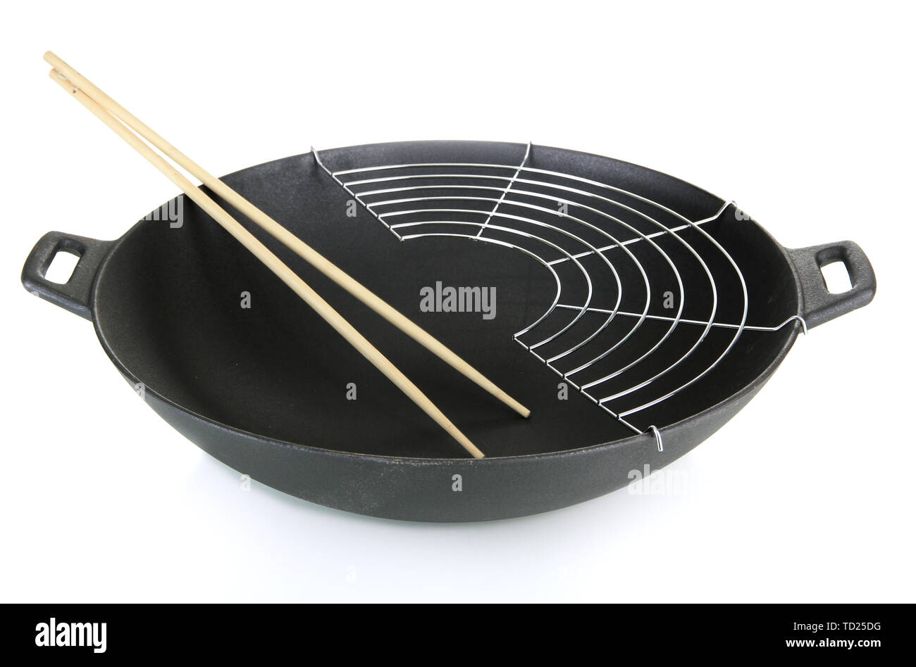 Black wok pan isolated on white Stock Photo - Alamy