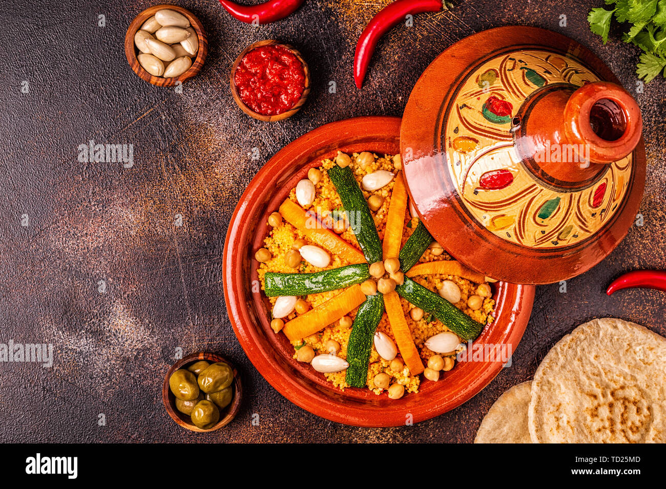 Vegetable tagine with almond and chickpea couscous, top view Stock ...