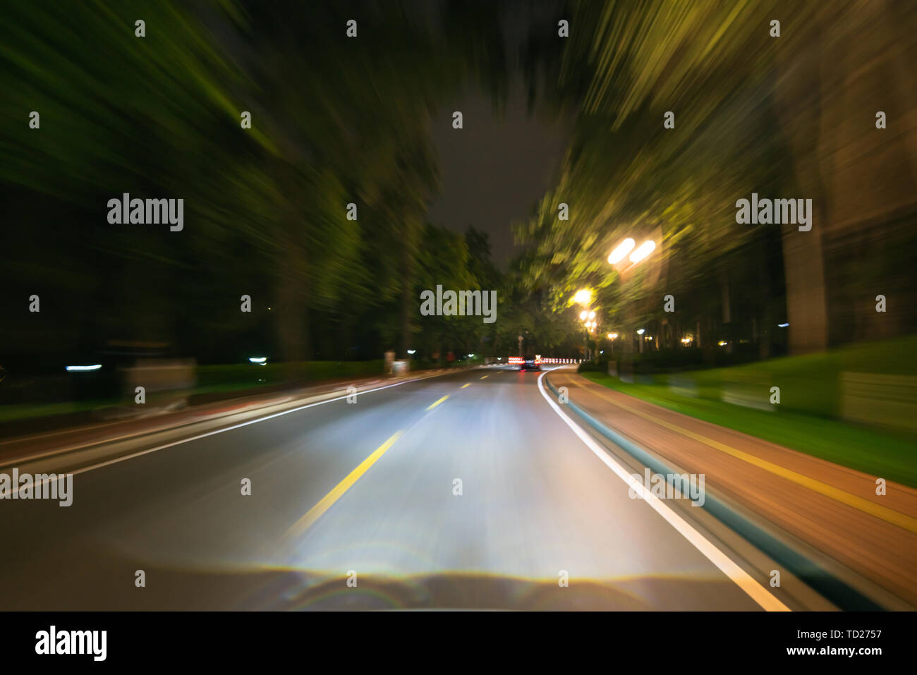 Driving on the road at night Stock Photo - Alamy