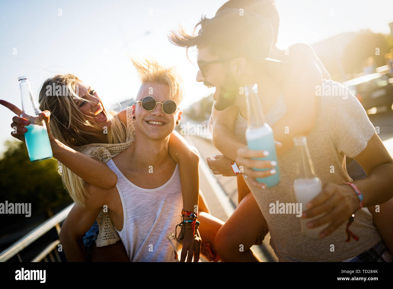 Group of young friends having fun together Stock Photo - Alamy