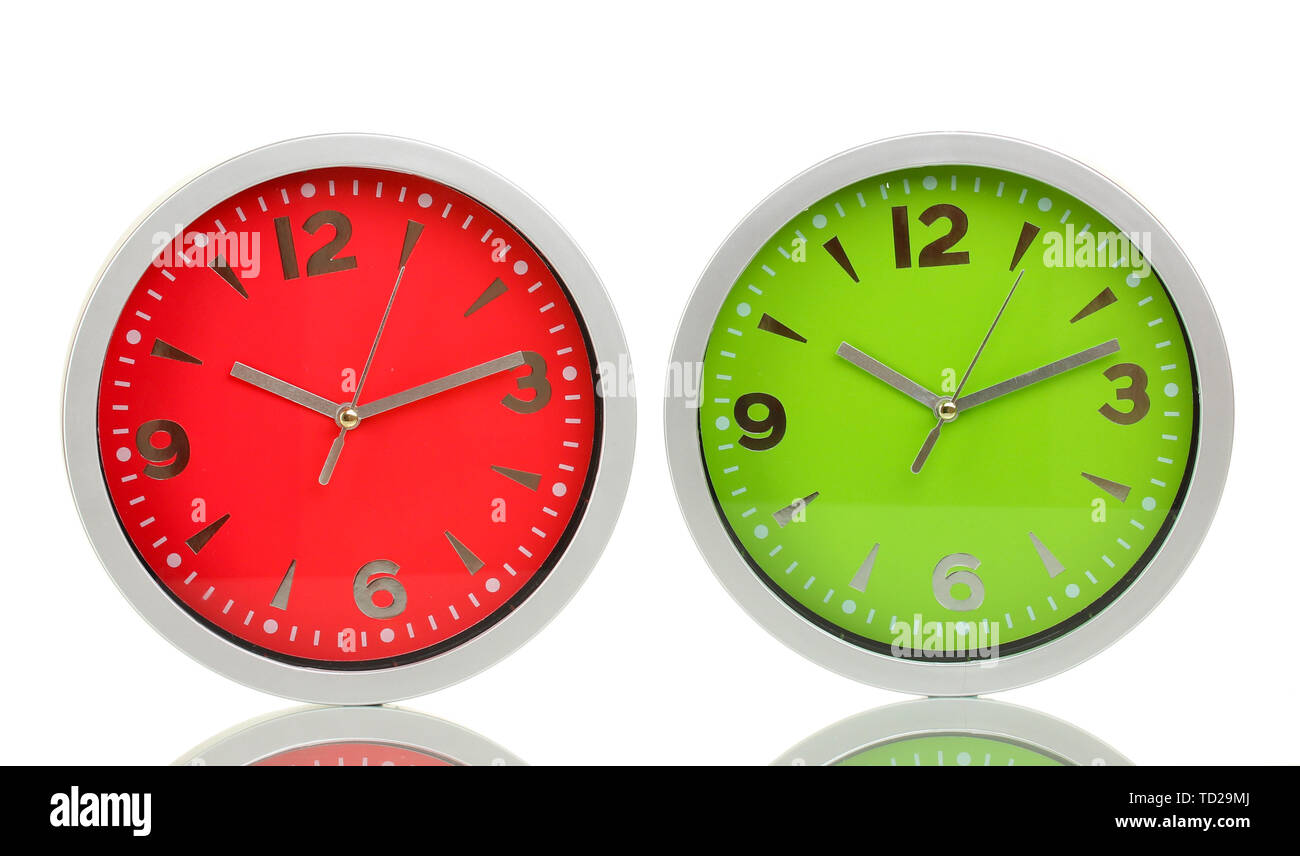 Round office clocks isolated on white Stock Photo - Alamy