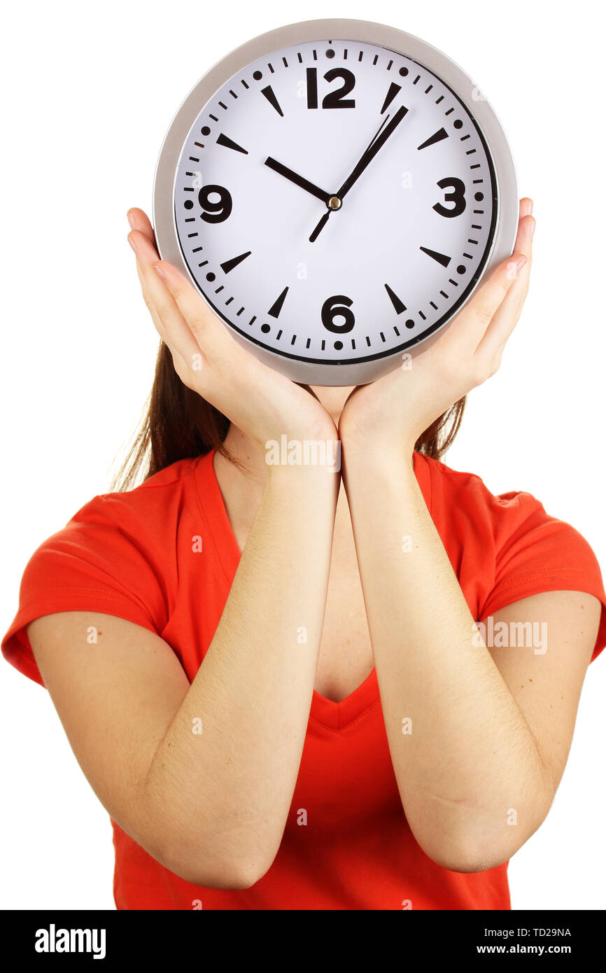 Girl holding clock over face isolated on white Stock Photo - Alamy