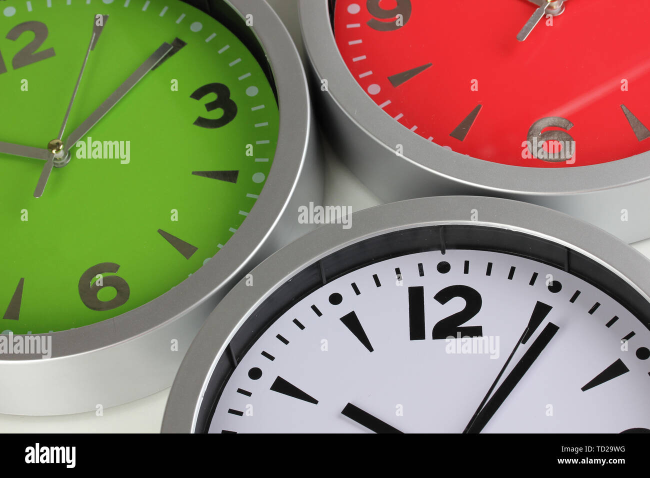 Round office clocks isolated on white Stock Photo - Alamy