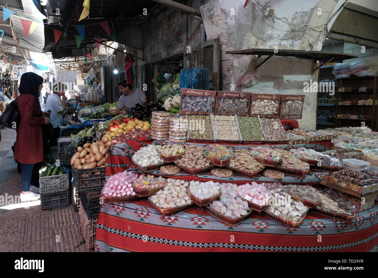 The souq market in the Old City of Nablus next to the An-Nasr Mosque in ...