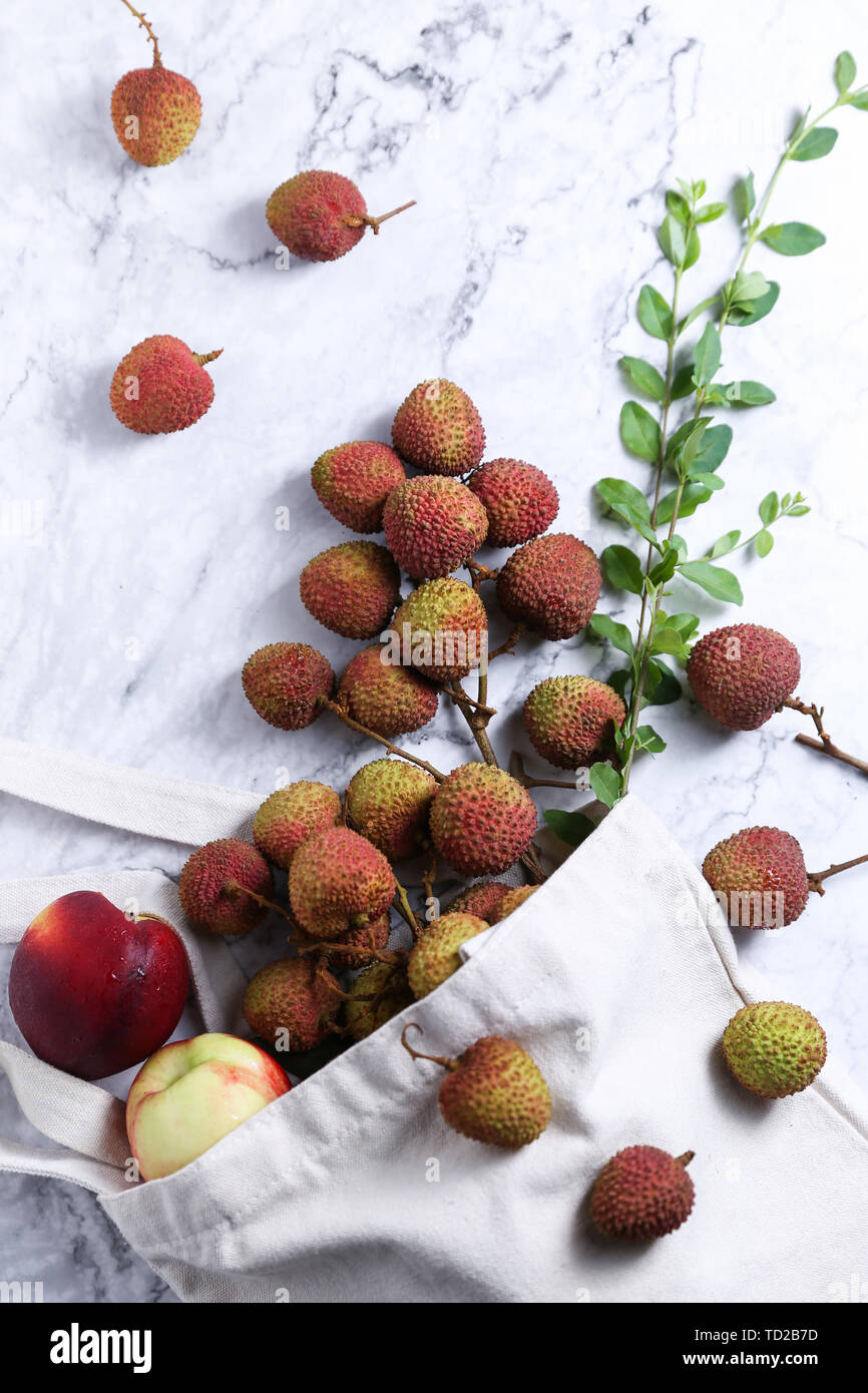 Litchi and manuscripts Stock Photo - Alamy