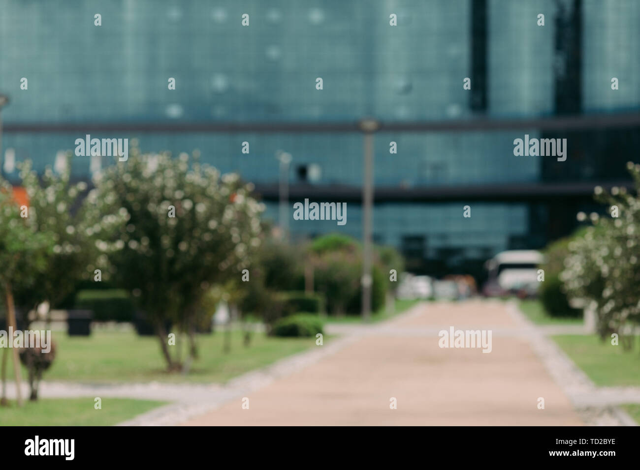 blur background of path way in the city park Stock Photo - Alamy