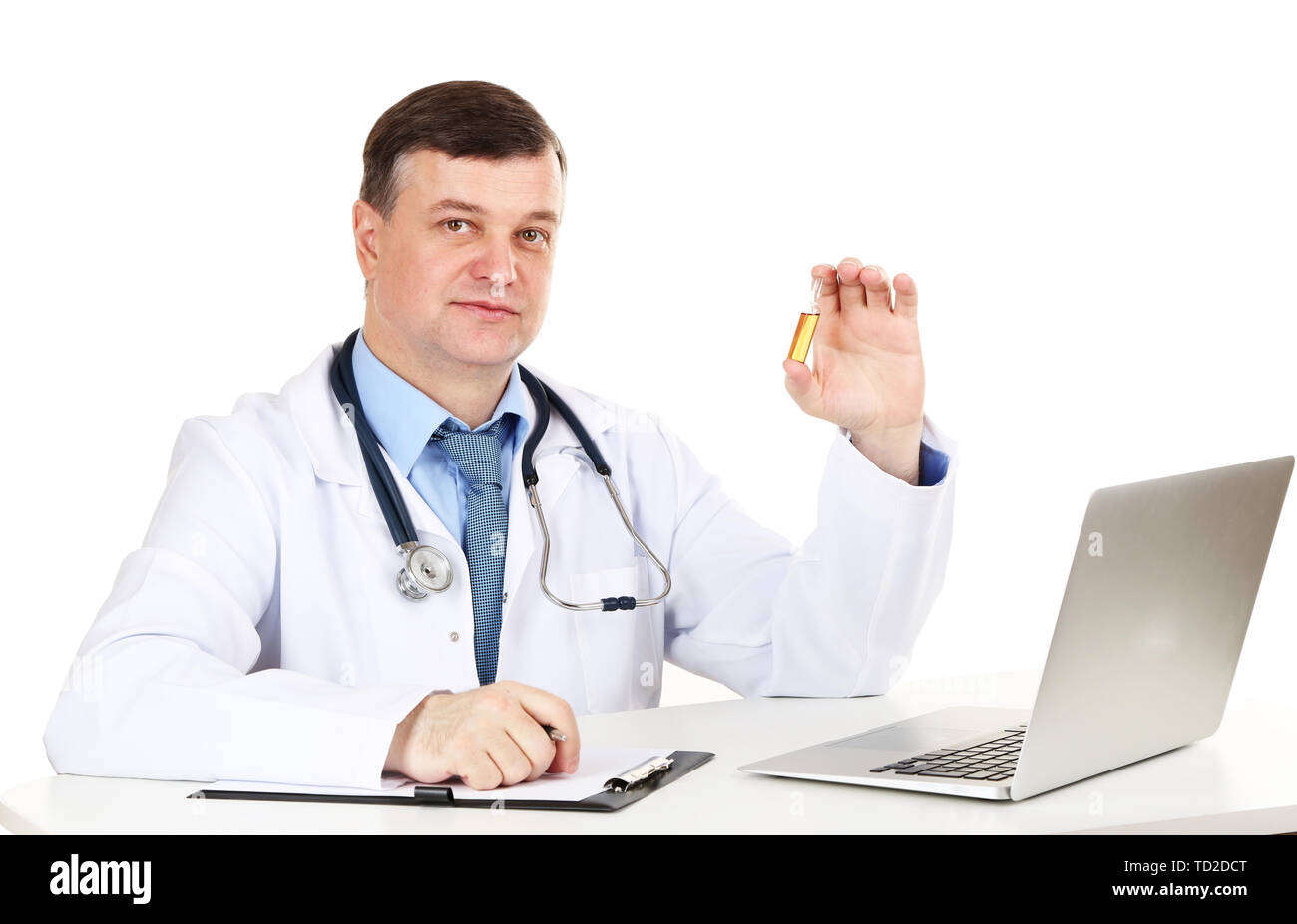Medical doctor working at desk isolated on white Stock Photo - Alamy