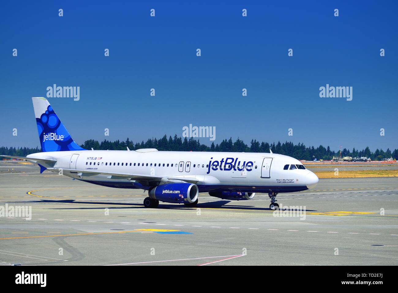 A small airliner at an American airport Stock Photo - Alamy