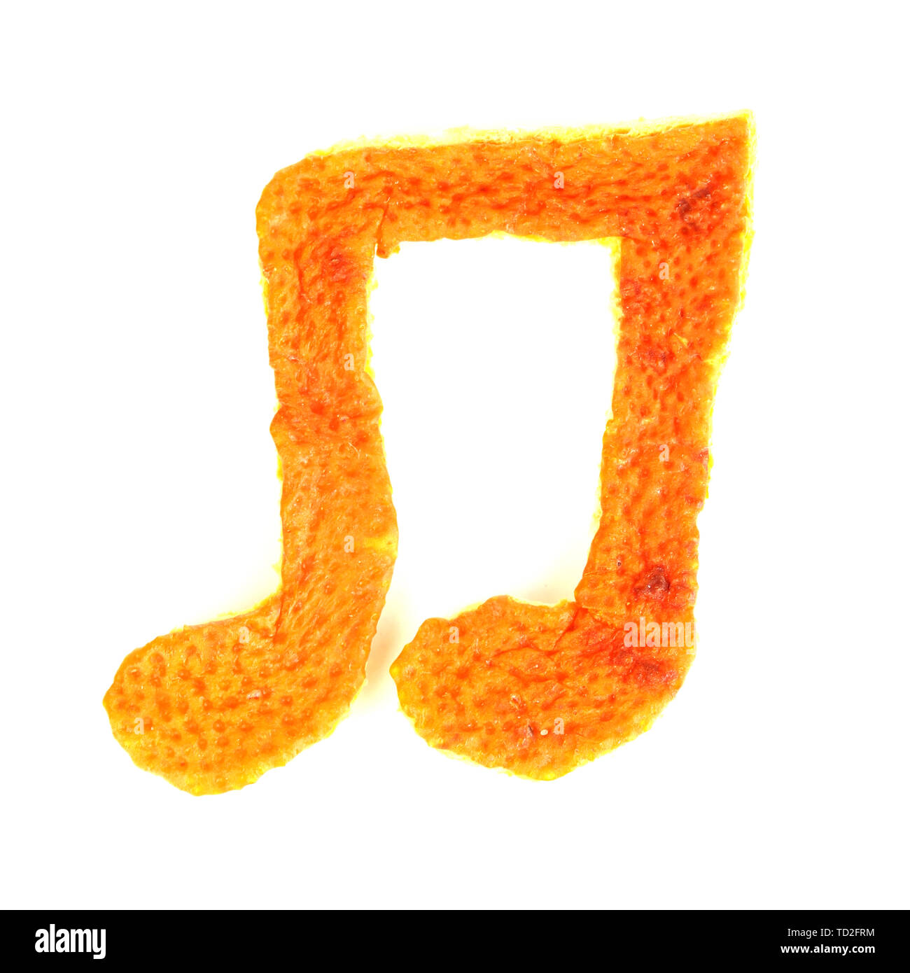 Decorative musical notes from dry orange peel isolated on white Stock ...