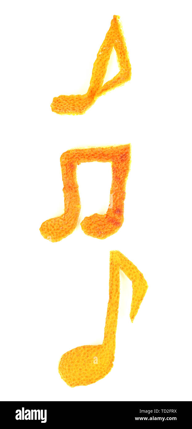 Decorative musical notes from dry orange peel isolated on white Stock ...