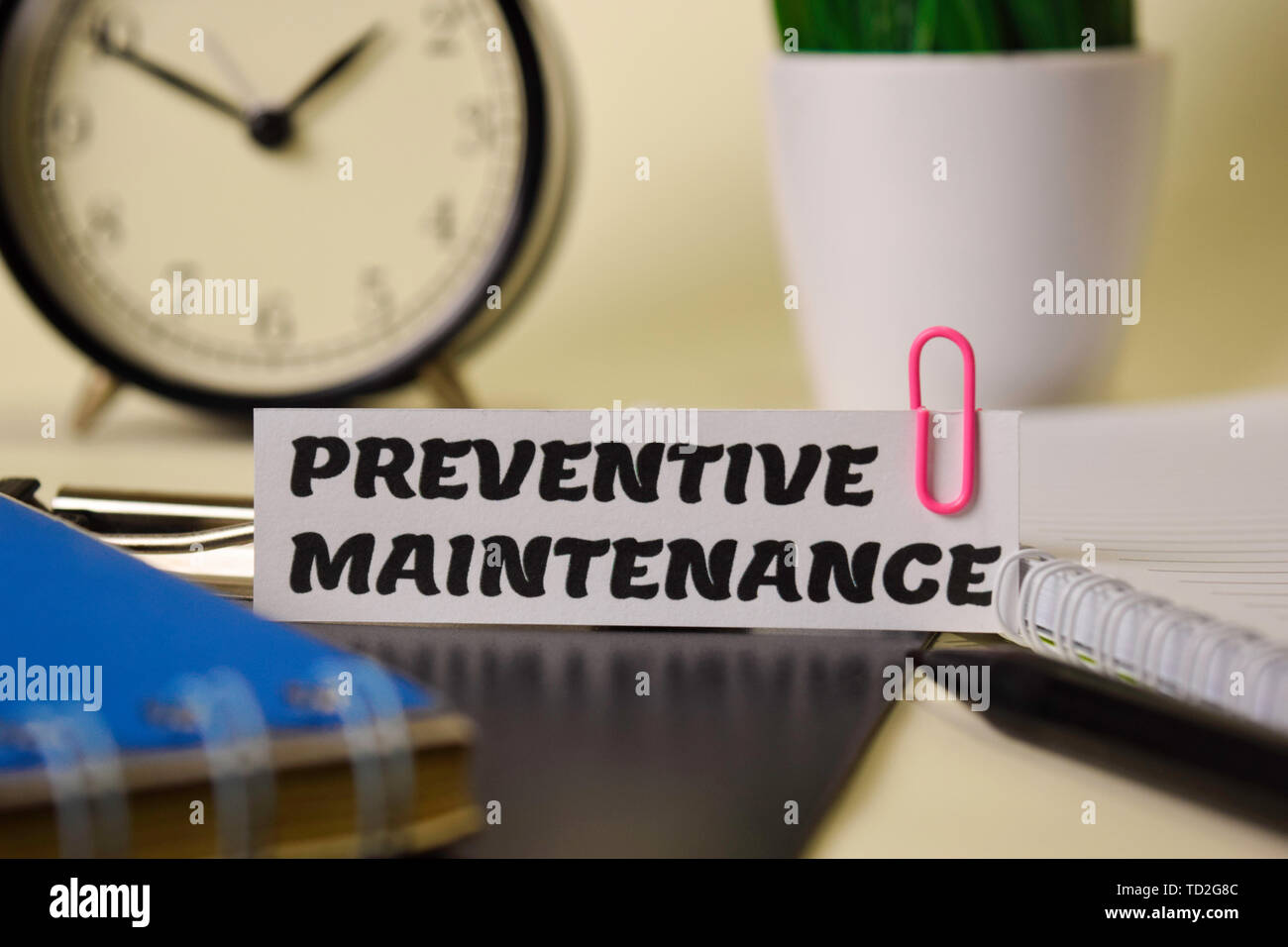 Preventive Maintenance on the paper isolated on it desk. Business and ...