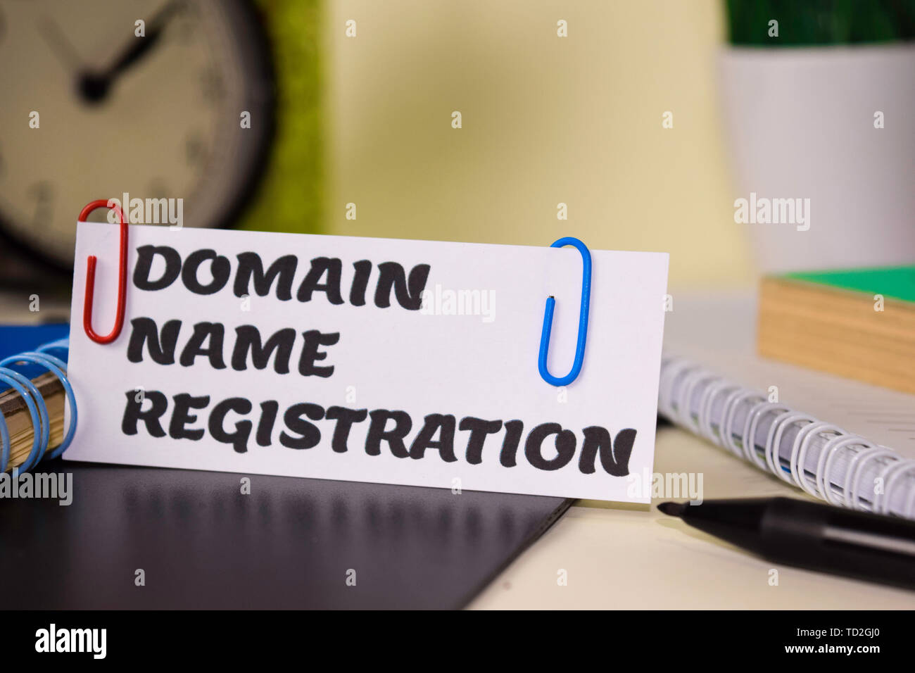 Domain Name Registration on the paper isolated on it desk. Business and ...