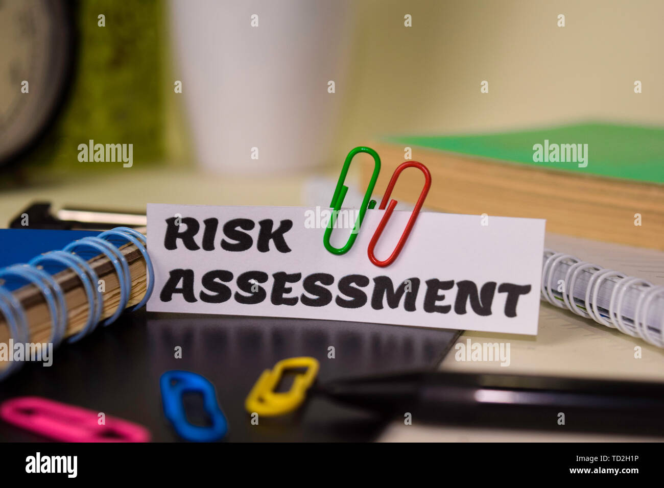 Risk Assessment on the paper isolated on it desk. Business and ...
