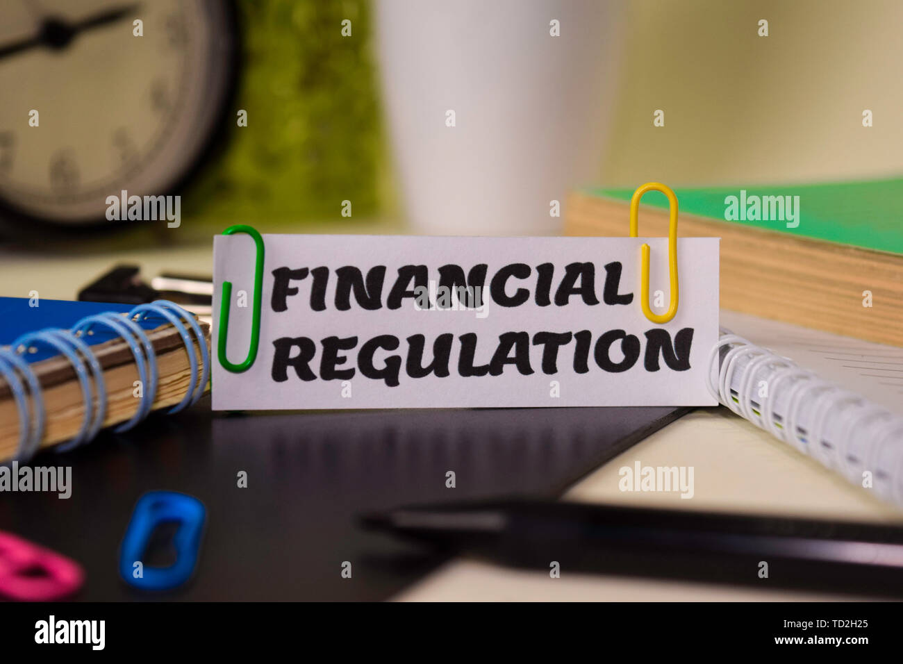 Financial Regulation on the paper isolated on it desk. Business and ...