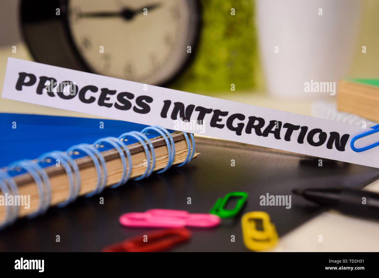 Process Integration on the paper isolated on it desk. Business and ...