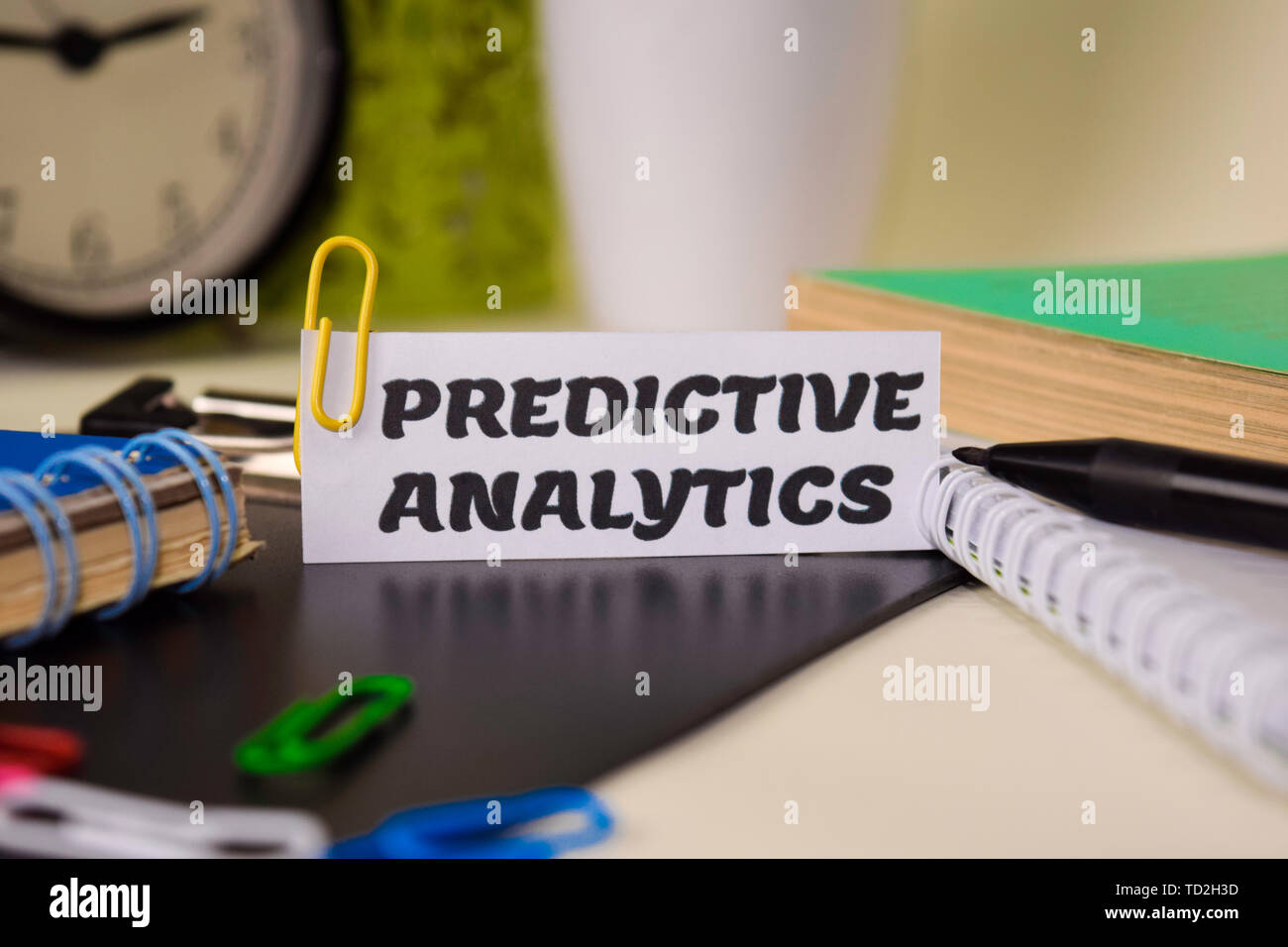 Predictive Analytics on the paper isolated on it desk. Business and ...