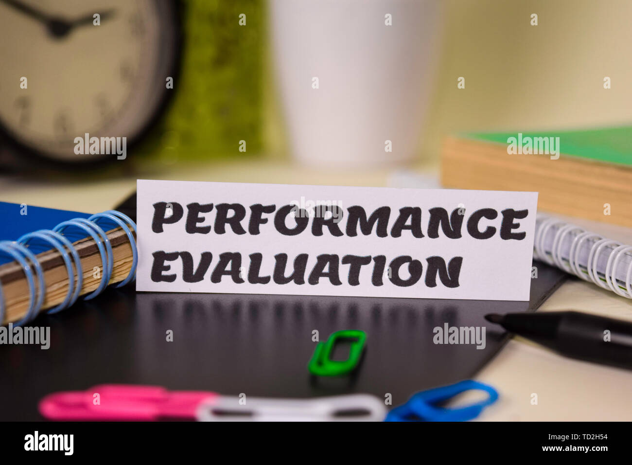 Performance Evaluation on the paper isolated on it desk. Business and ...