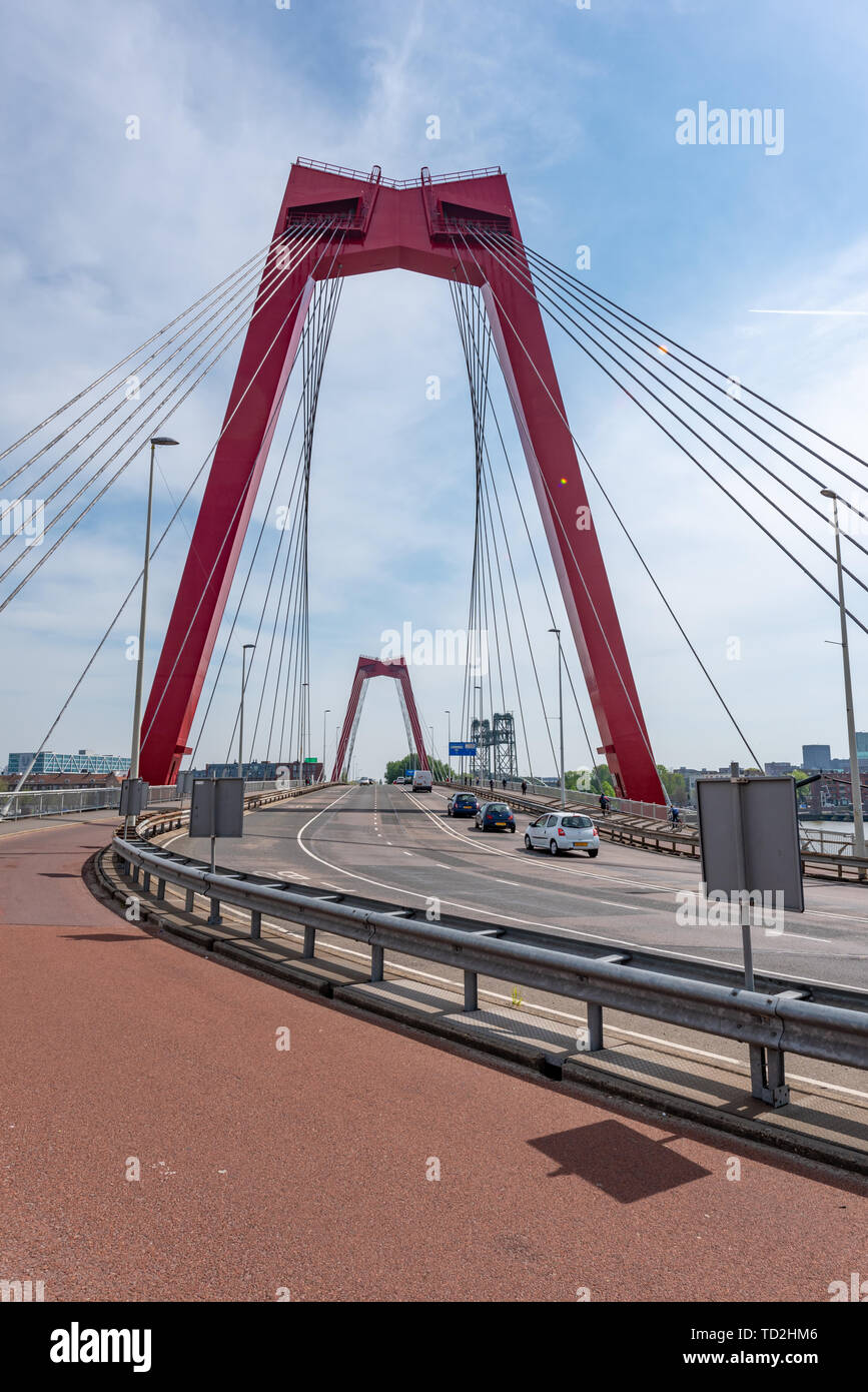 Rotterdam, Netherlands - April 23, 2019 : Willemsbrug bridge red cable ...