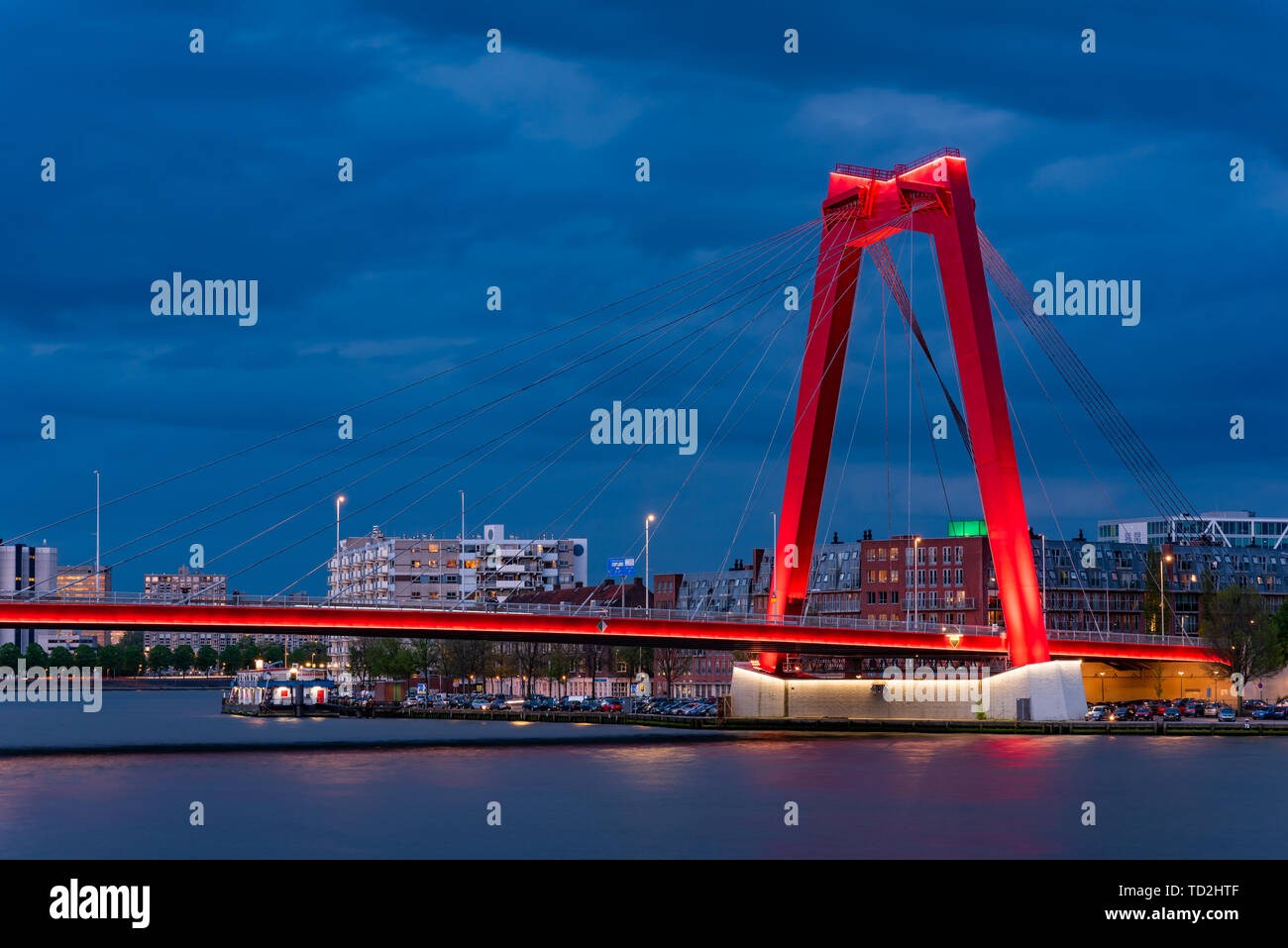Rotterdam, Netherlands - April 26, 2019 : Willemsbrug bridge red cable ...