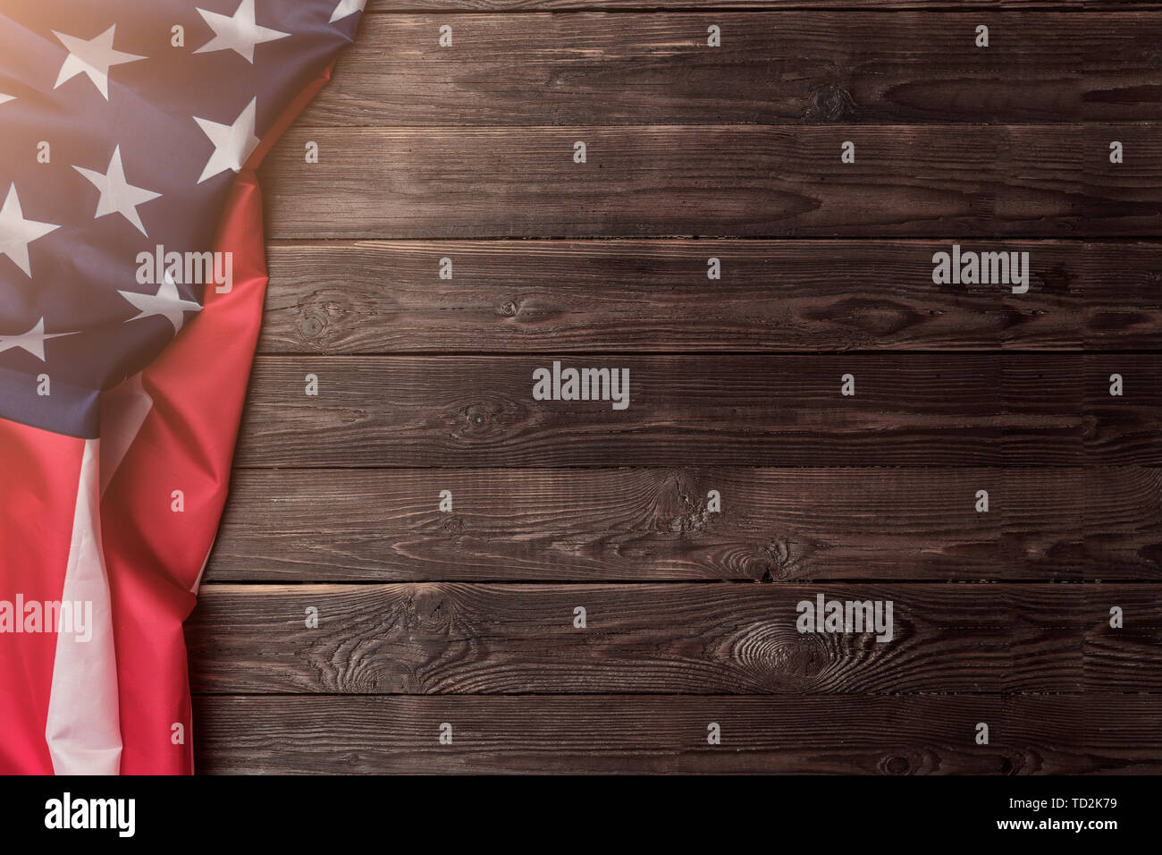 USA flag sideways on an empty wooden background Stock Photo - Alamy