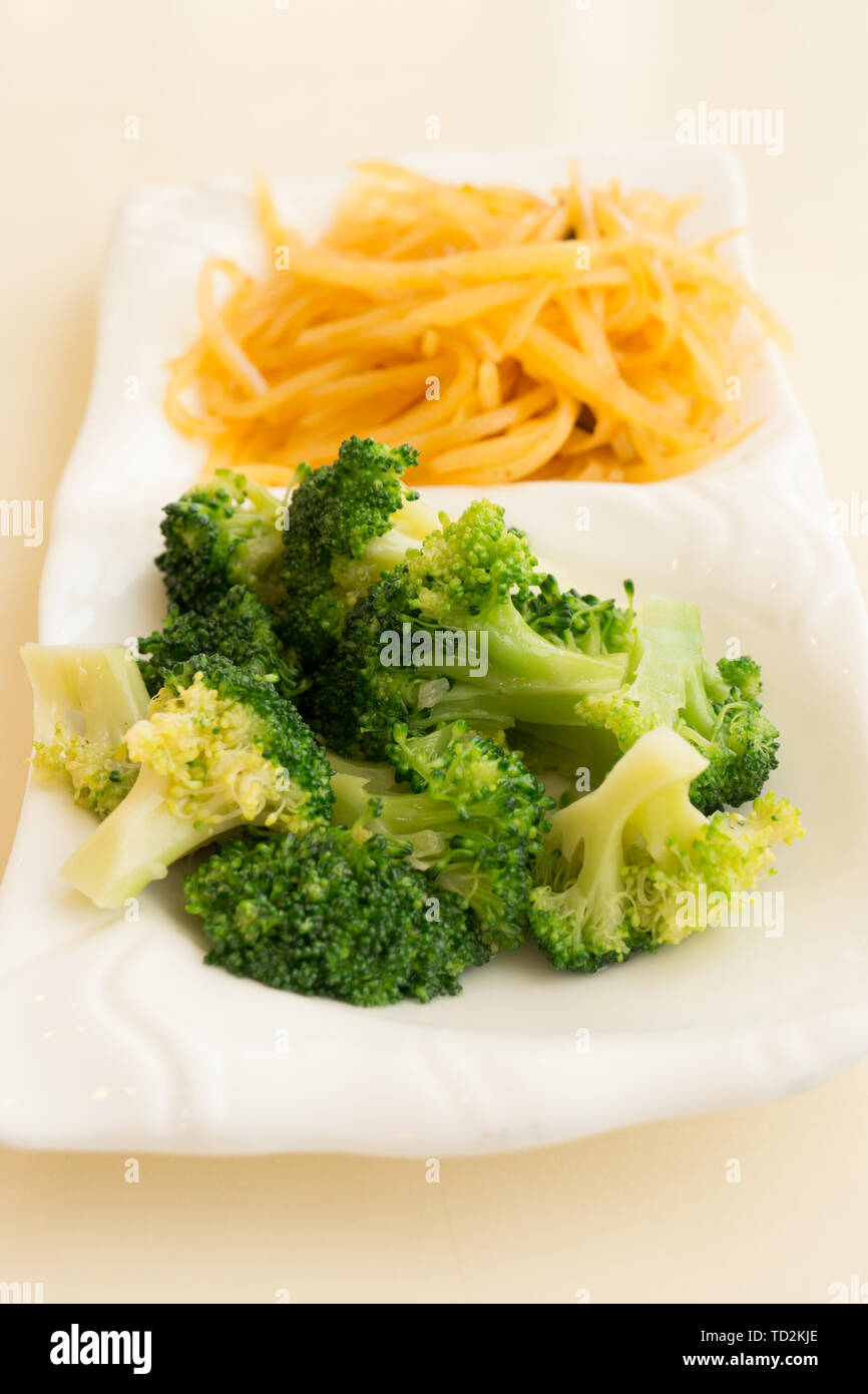 Cold broccoli shredded potatoes Stock Photo - Alamy